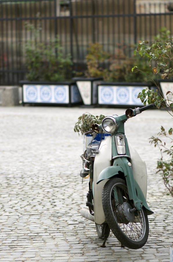 Old Motorcycle with Flowers Stock Photo - Image of rock, antique: 34837020