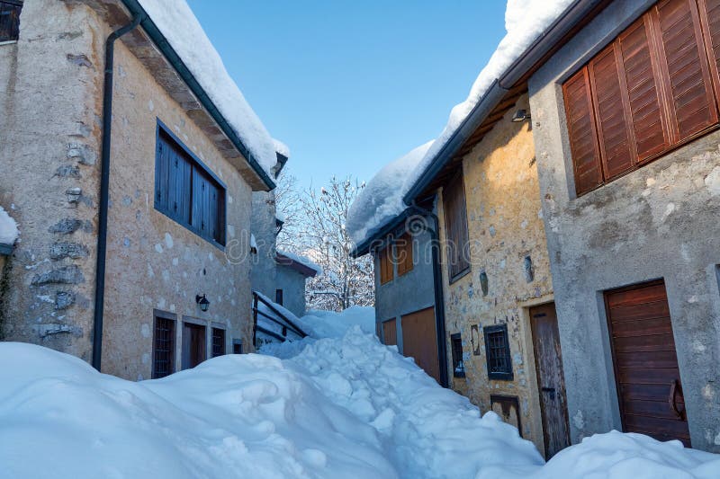 Old Mountain Houses Half-buried by Falling Snow Stock Photo - Image of ...