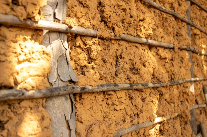 Old Mud Wall and Wooden Sticks. Old Tropical House Made with Basic ...