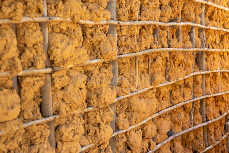 Old Mud Wall and Wooden Sticks. Old Tropical House Made with Basic ...
