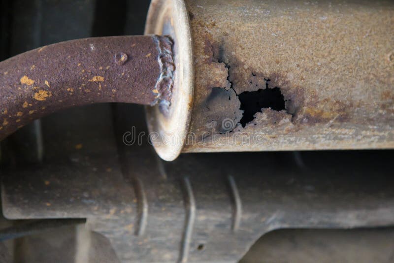 Old muffler expire. stock photo. Image of pipe, lift - 250002654