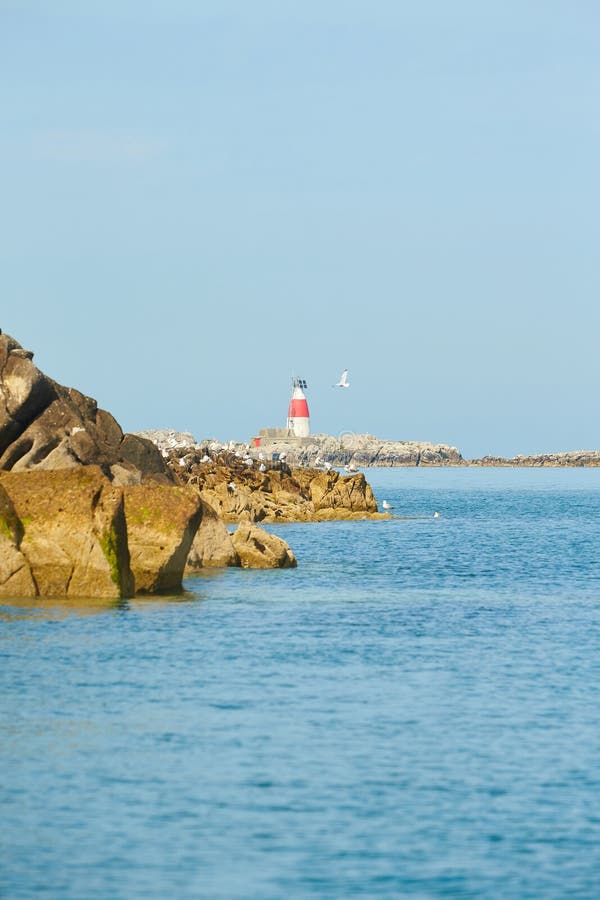 Old Muglins Lighthouse on the Isolated Island the Backdrop of the Blue ...