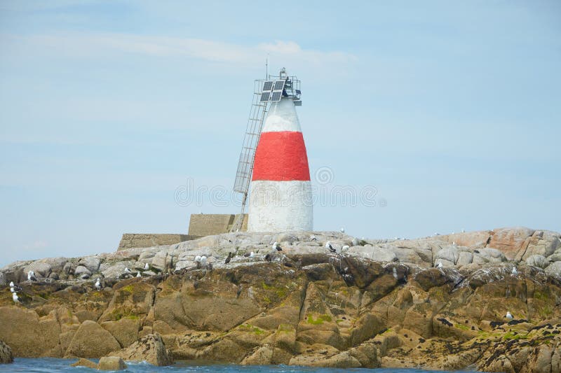 Old Muglins Lighthouse on the Isolated Island the Backdrop of the Blue ...