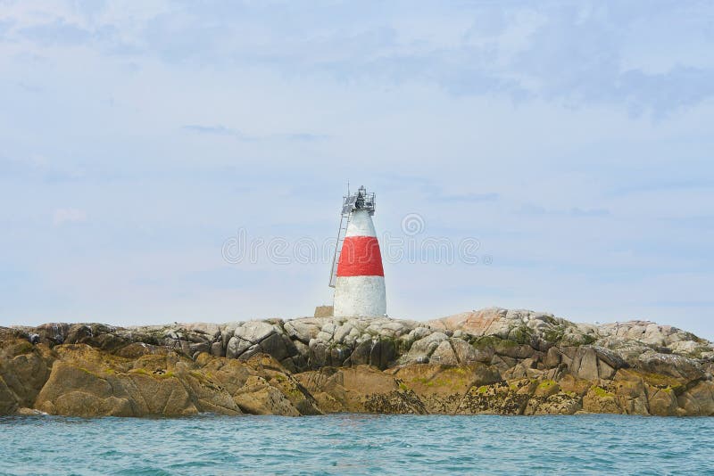Old Muglins Lighthouse on the Isolated Island the Backdrop of the Blue ...