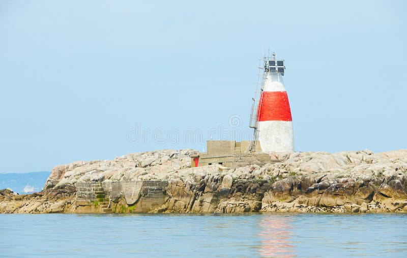 Old Muglins Lighthouse on the Isolated Island the Backdrop of the Blue ...