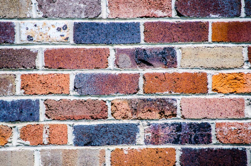 Old Multi Coloured Brick Wall in Close-up for Background. Stock Photo ...
