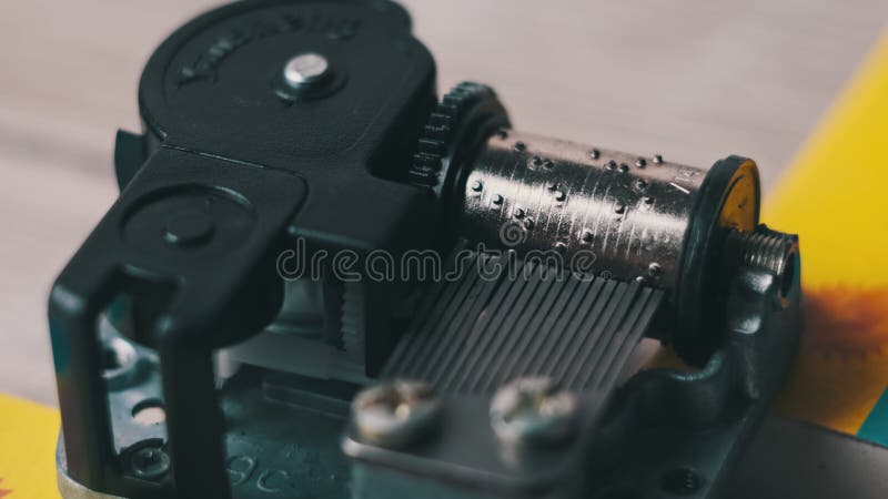 Old Music Box Mechanism with Spinning Cylinder and Cogs in Macro Stock ...