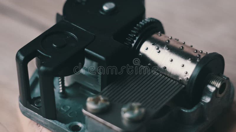 Old Music Box Mechanism with Spinning Cylinder and Cogs in Macro Stock ...