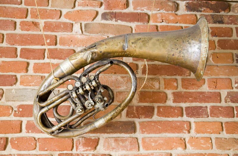 Old Music Instrument on the Wall Stock Photo - Image of horn, brick ...