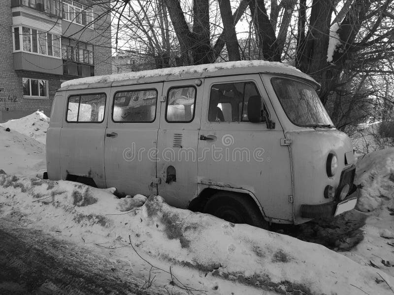 Old Non-working Car in the Snow Under a Tree Stock Image - Image of ...