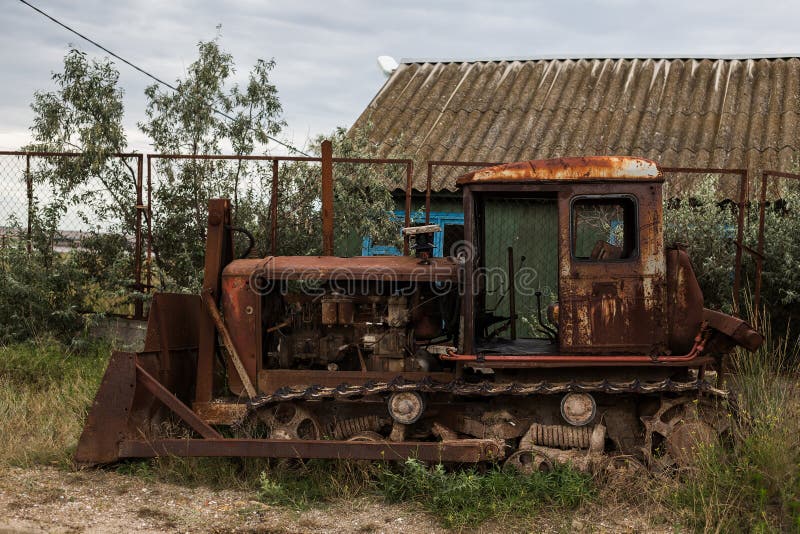 Old Rusty Broken Rural Tractor Stands in the Backyard Stock Photo ...
