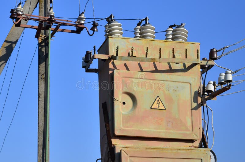 Old and Obsolete Electrical Transformer Against the Background of a ...