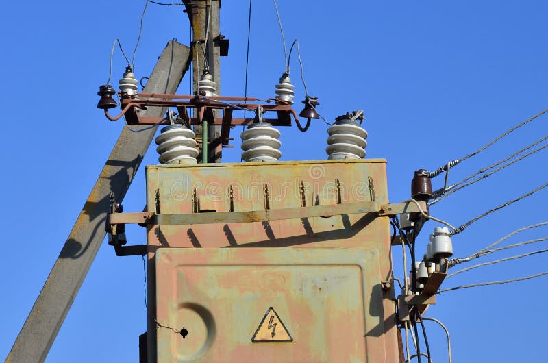 Old and Obsolete Electrical Transformer Against the Background of a ...