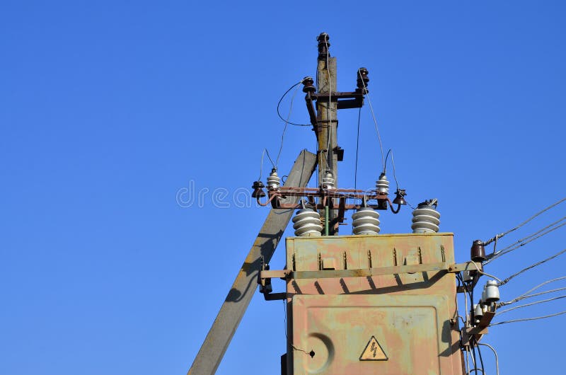Old and Obsolete Electrical Transformer Against the Background of a ...