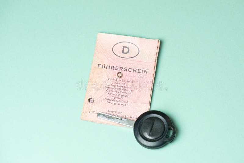 Old Obsolete Pink German Driving License with a Car Key, Exchange ...