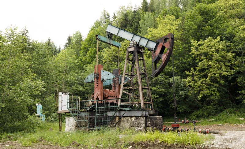 An Old Oil Rig Pollutes the Environment. Mining Stock Image - Image of ...