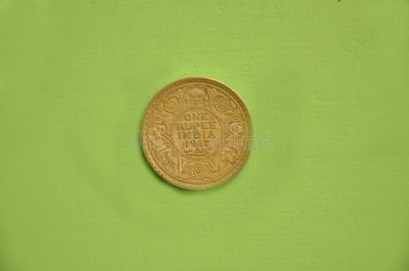Old one Rupee India 1917 stock photo. Image of coin - 241606878