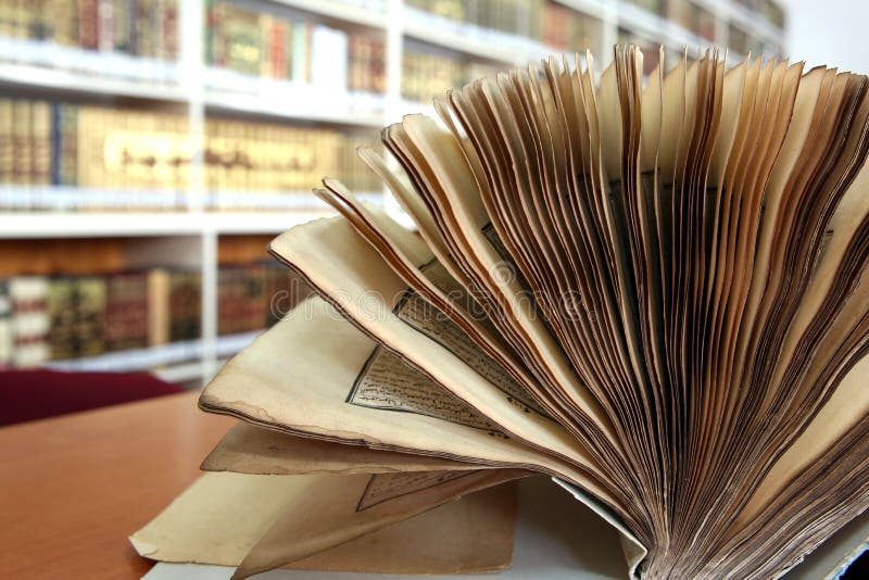 Old open book in library stock photo. Image of collection - 54641548