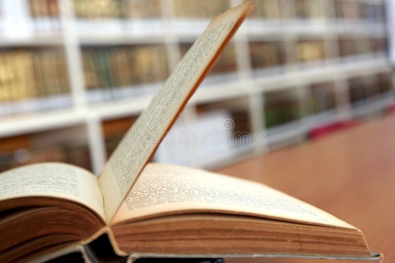 Old open book in library stock image. Image of archives - 54641569