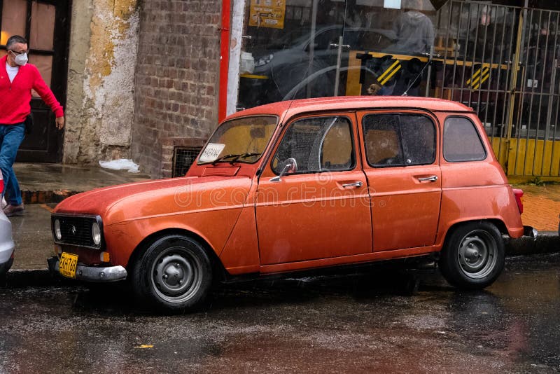 Old Orange Car on a Rainy Day in Bogota Editorial Photo - Image of city ...