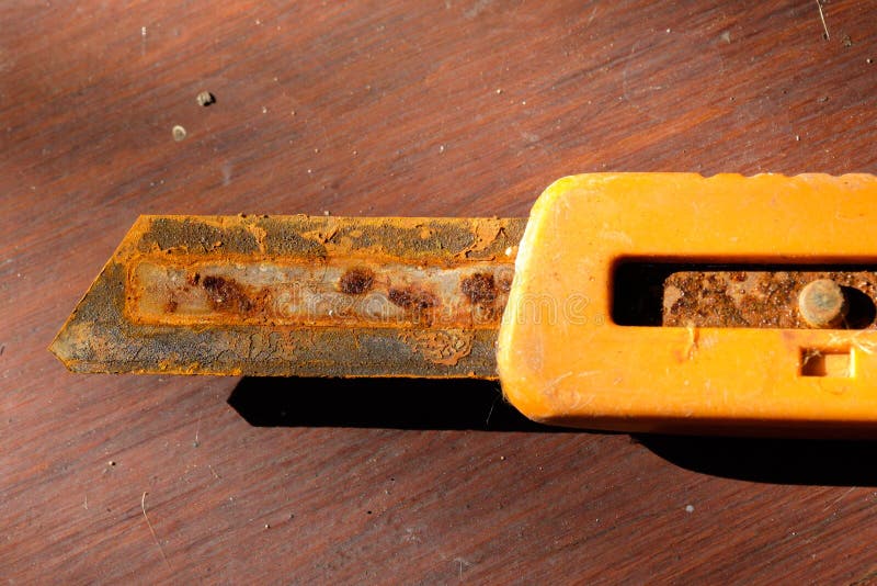 Old Orange Rusty Cutter Knife Stock Photos - Free & Royalty-Free Stock ...