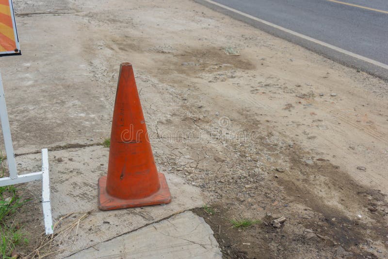 Old Orange Traffic Cone on Dirt Surface Stock Photo - Image of damaged ...