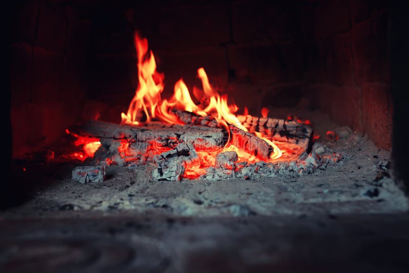 Old oven with flame fire stock photo. Image of fireplace - 78609786