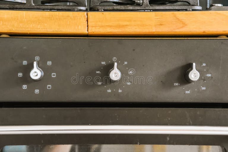 A Close Up of a Stove with Two Dials Stock Photo - Image of mailbox ...