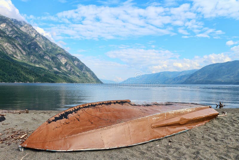 Overturned Boat and Submerged Swing from Lake Maggiore in Flood in ...