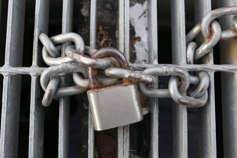 Old padlock chain lock. stock photo. Image of keyhole - 76736080
