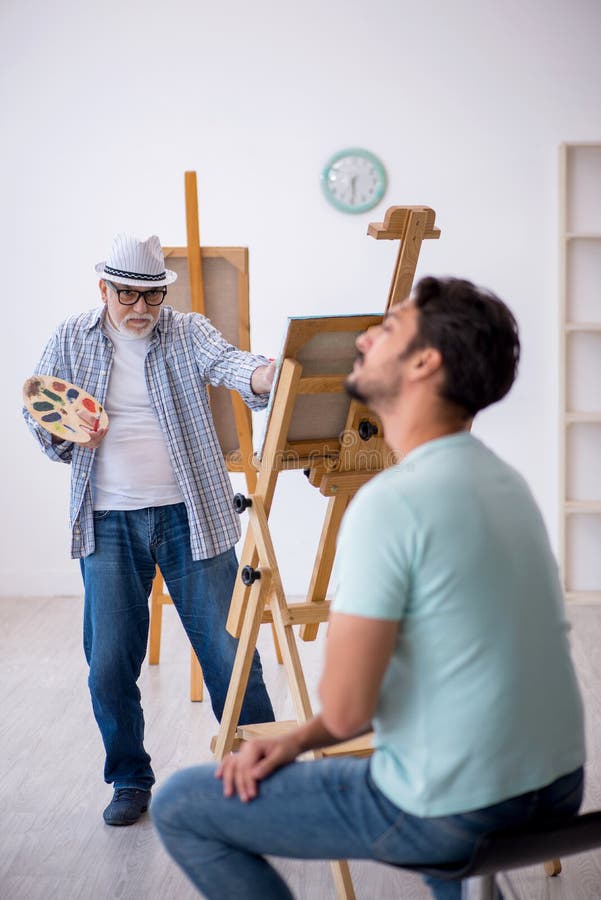 Old Painter and Young Male Model at the Studio Stock Image - Image of ...