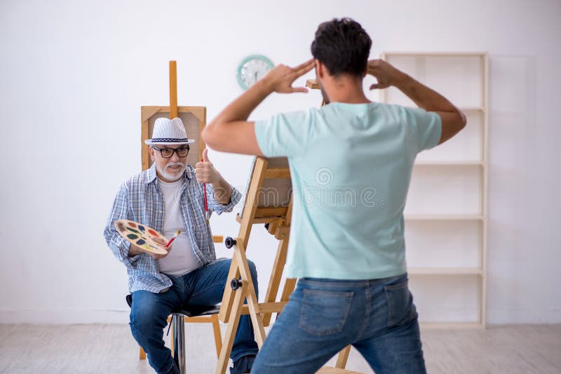 Old Painter and Young Male Model at the Studio Stock Image - Image of ...