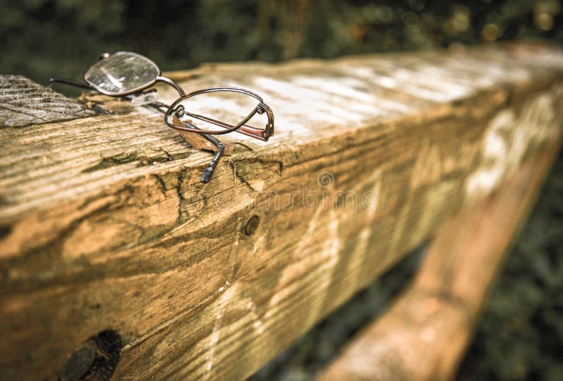 Old Pair of Spectacles with Missing Lens, Left on a Gate Post Stock ...