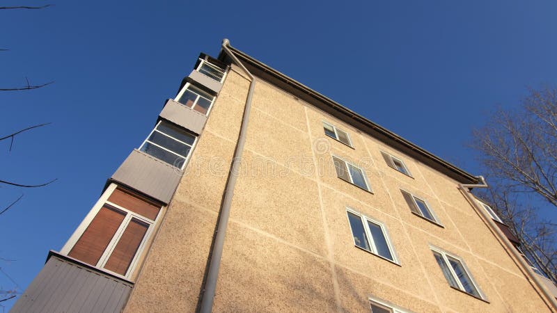 Old Panel Apartment Building with Waterspout Under Clear Sky Stock ...