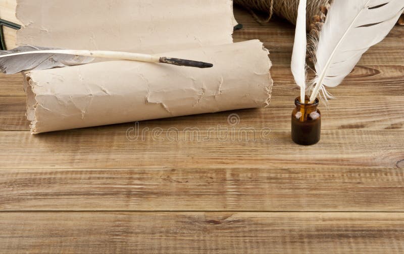 Old Paper and Feather with Ink on a Wooden Stock Photo - Image of ...