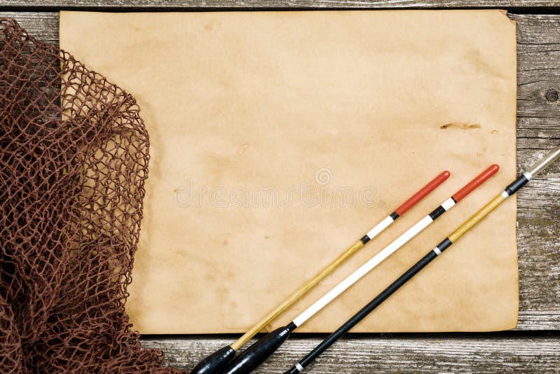 An Old Paper, a Fishing Net and a Fishing Float on a Wooden Table ...