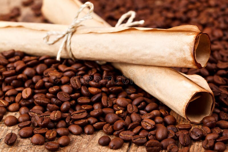 Old Paper Rolls on Coffee Beans Stock Photo - Image of beverage, note ...