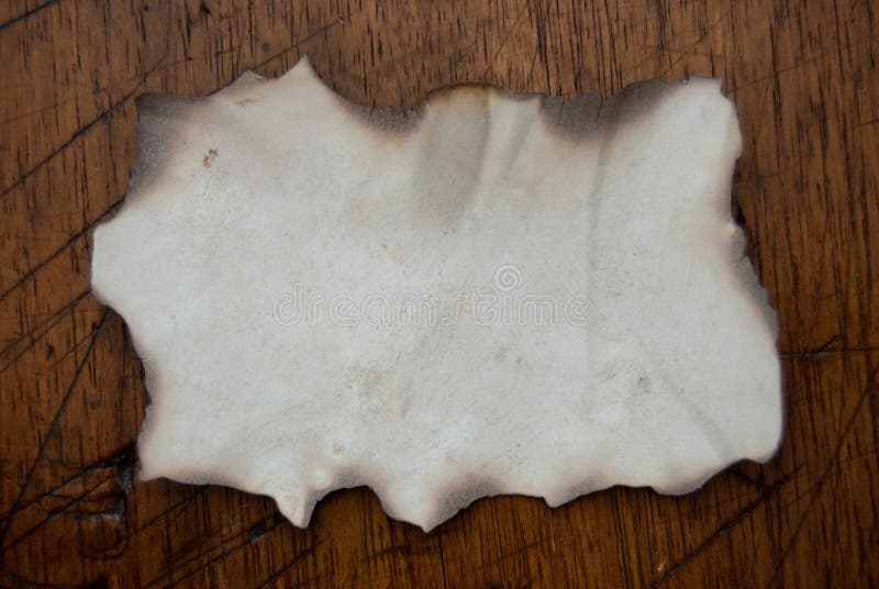 Old paper on wood desk stock photo. Image of stained - 31187490