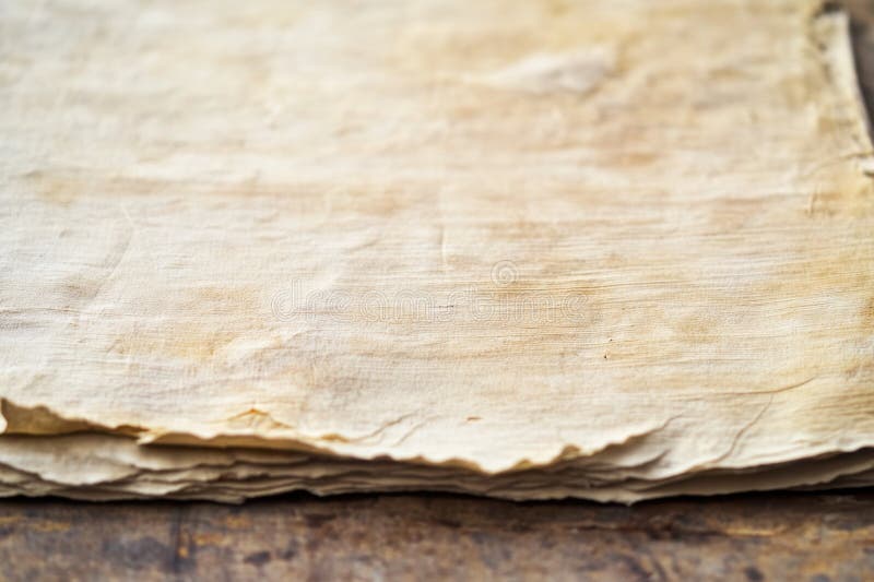 Old Parchment on Wood in Soft Light Stock Photo - Image of design ...