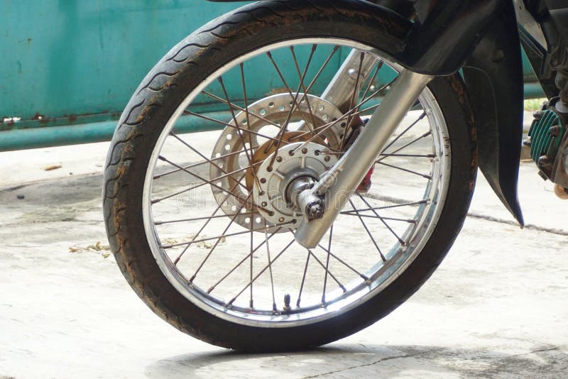 An Old Motorcycle Wheel with Disc Brakes Stock Photo - Image of black ...
