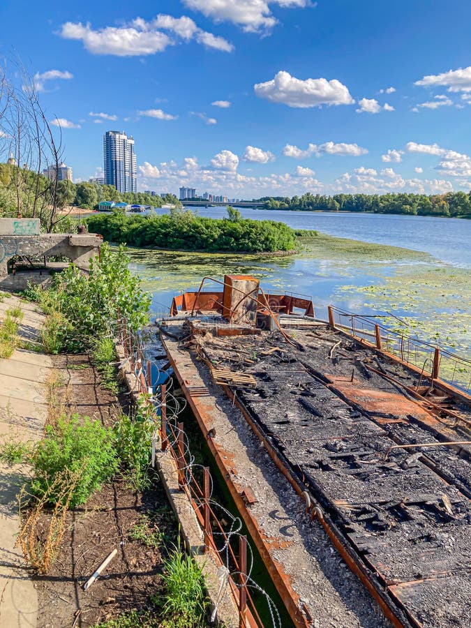 An Old, Partially Submerged Dilapidated Structure with Rusted Metal ...