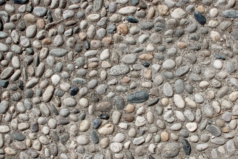 An Old Pebblestone Road Cobbled with Natural Stones Stock Photo - Image ...