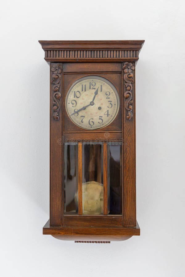 Old Pendulum Clock on a White Wall Stock Photo - Image of elegance ...