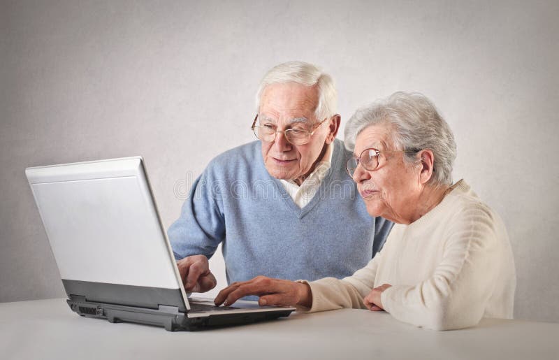 Old people using a laptop stock image. Image of business - 37079177