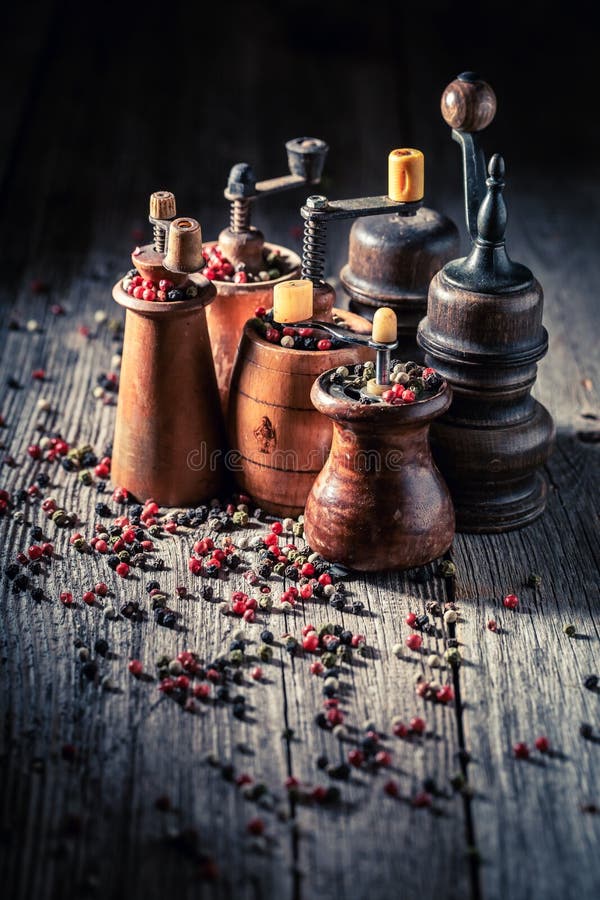 Old Pepper Mills with Black and Red Pepper Stock Image - Image of ...