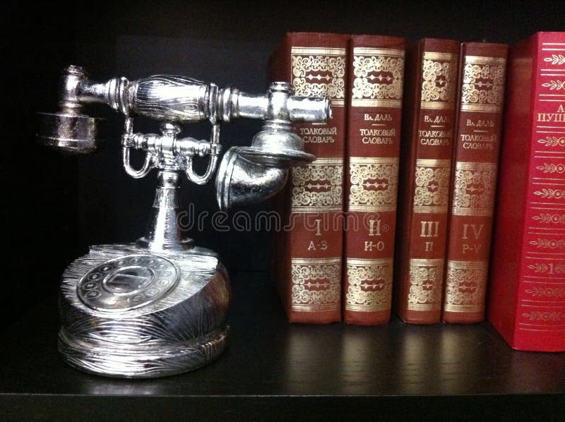Old phone and books stock image. Image of bookshelf, books - 50082233