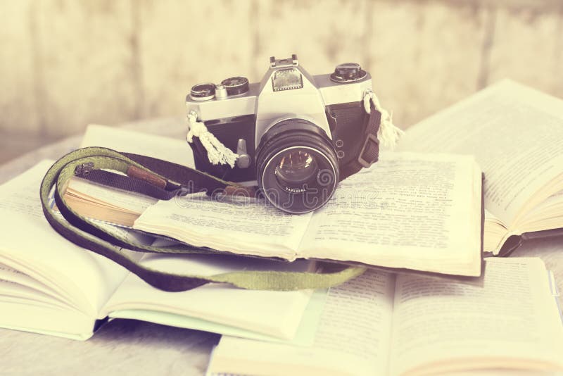 Old photo camera and books stock image. Image of summer - 59731891