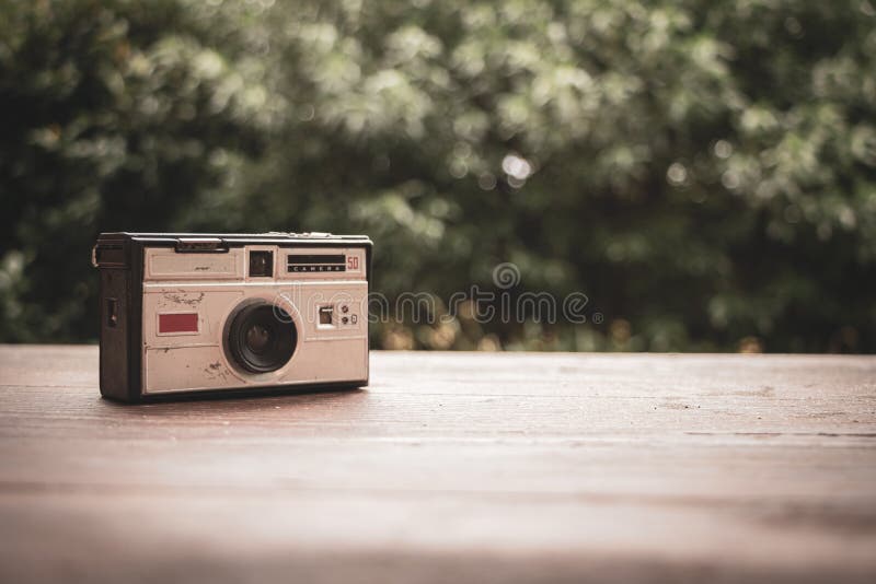 Old photo camera from 60s stock image. Image of brown - 176140843