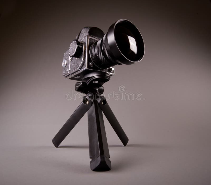 Old Photo Camera with Tripod on Grey in Hi-Res Stock Image - Image of ...