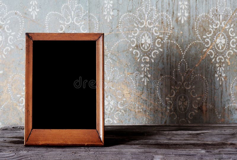 Old photo-frame on table stock photo. Image of effect - 11530286
